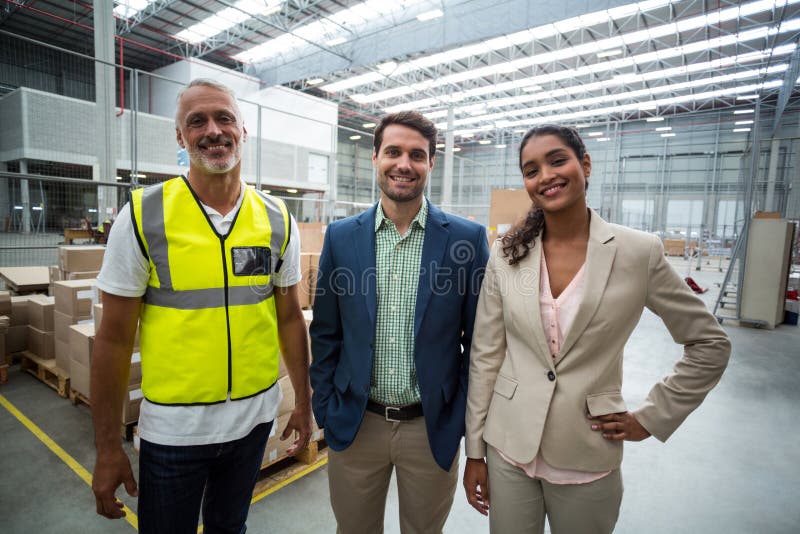 Portrait of Warehouse Team Standing Together Stock Image - Image of ...