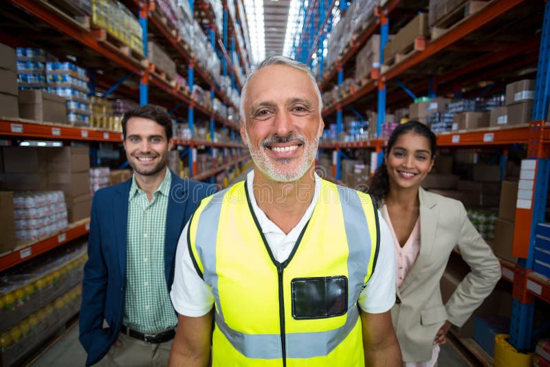 Portrait of Warehouse Team Standing Together Stock Image - Image of ...