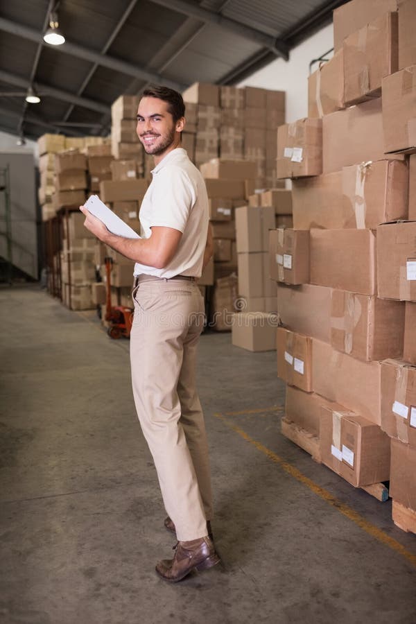 Portrait of Warehouse Worker with Clipboard Stock Photo - Image of full ...