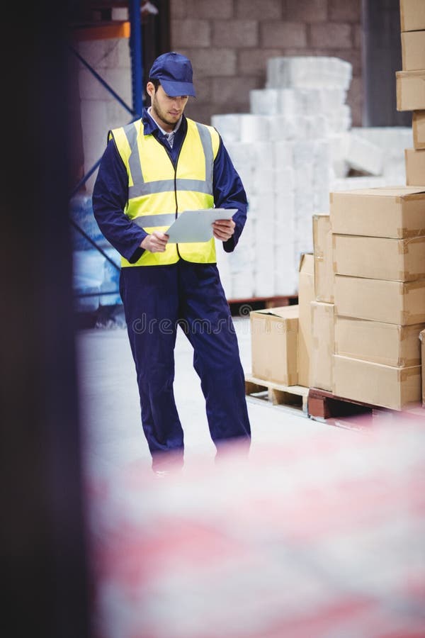 Portrait of Warehouse Worker with Clipboard Stock Image - Image of ...