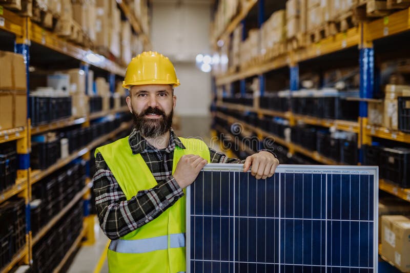 Portrait of Warehouse Worker with Solar Panel. Stock Photo - Image of ...