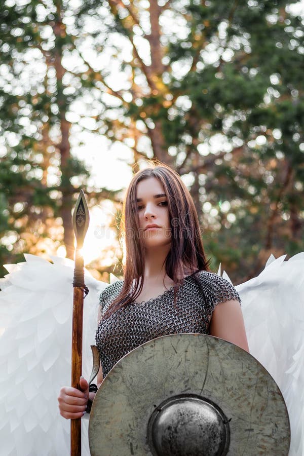 Warrior Woman In Chain Mail With Steel Bracers And Greaves And Wings