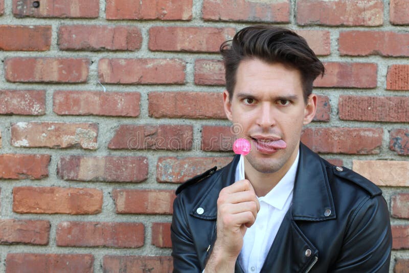 Portrait of Weirdo Man, Isolated on Brick Wall Background Stock Photo ...