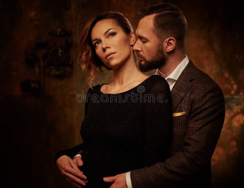 Portrait of Well-dressed Couple in Expression of Feelings Stock Photo ...