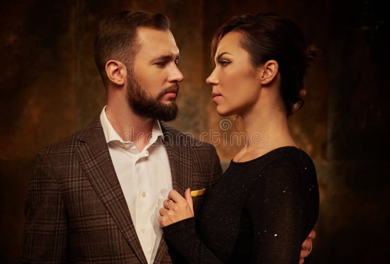 Portrait of Well-dressed Couple in Expression of Feelings Stock Photo ...