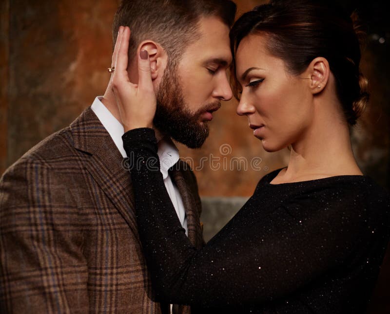Portrait of Well-dressed Couple in Expression of Feelings Stock Photo ...