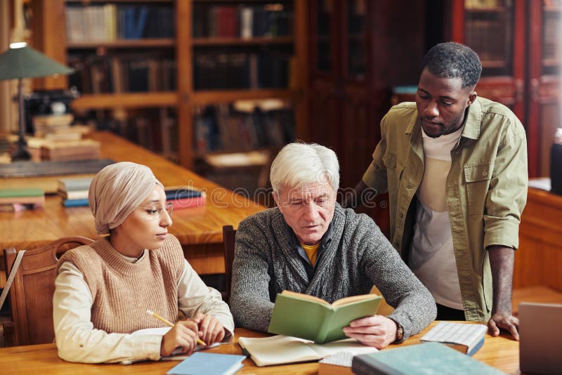 People Studying in Library stock image. Image of student - 241885281