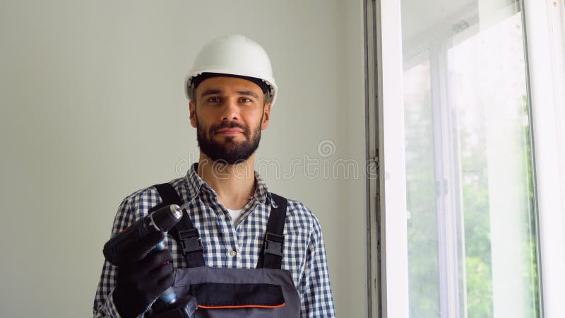 Portrait of a Window Installer with a Screwdriver Stock Video - Video ...