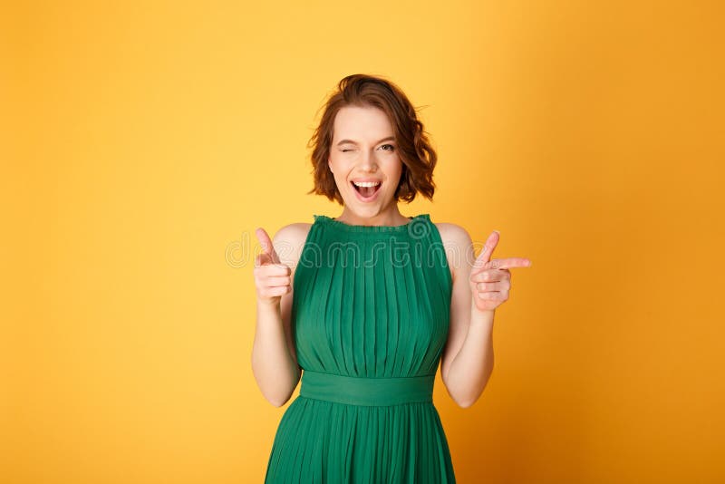 Portrait of Winking Woman Pointing at Camera Stock Image - Image of ...