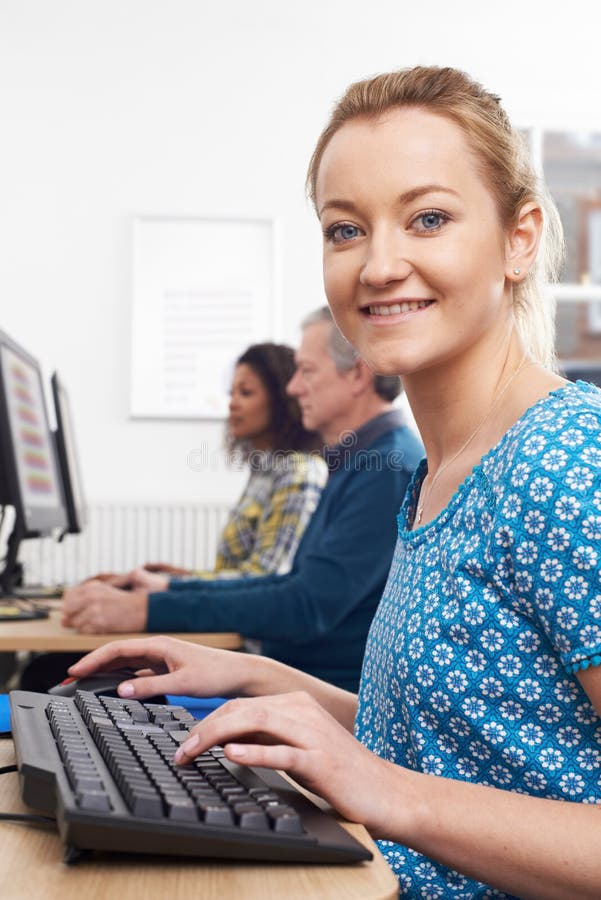 Portrait of Woman Attending Computer Class Stock Photo - Image of ...