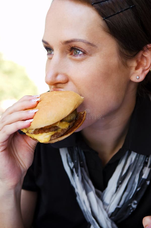 Portrait of Woman with Cheeseburger Stock Image - Image of pause ...