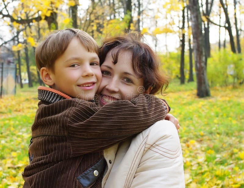Portrait of a Woman with a Child Stock Photo - Image of lifestyles ...