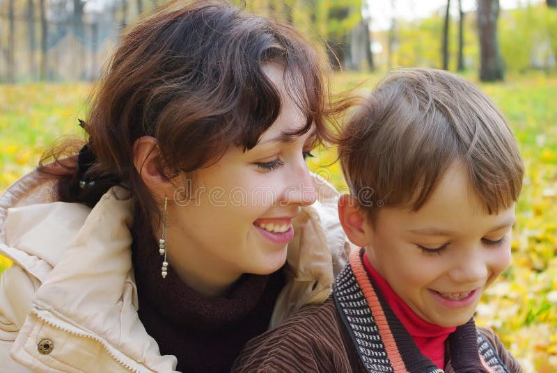 Portrait of a Woman with a Child Stock Photo - Image of field, love ...