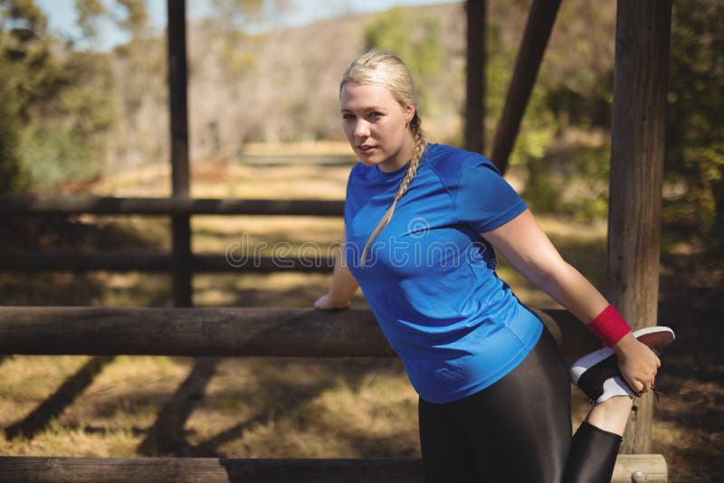 Portrait of Woman Exercising during Obstacle Course Stock Photo - Image ...