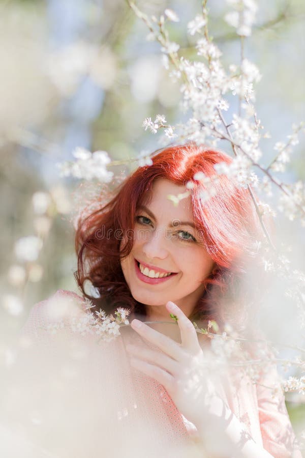 Portrait of a Woman in a Flowering Tree Stock Image - Image of head ...
