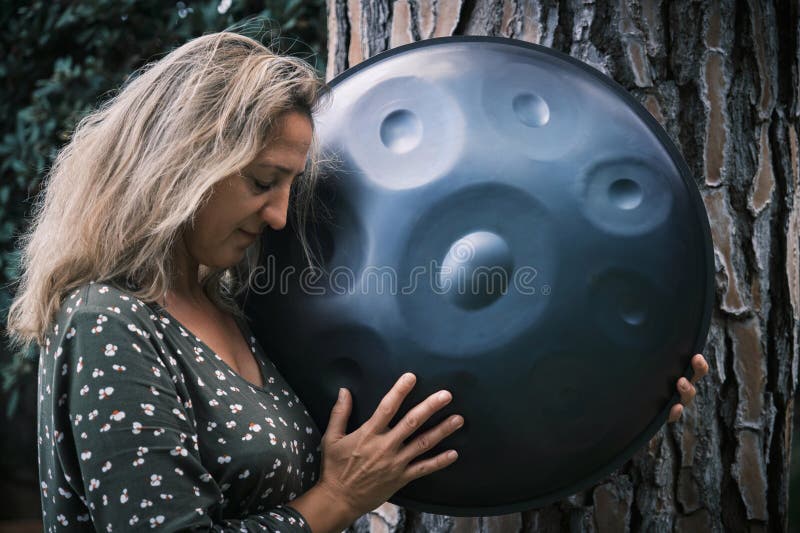 Portrait of a Woman with a Handpan Her Hands Stock Photo - Image of ...