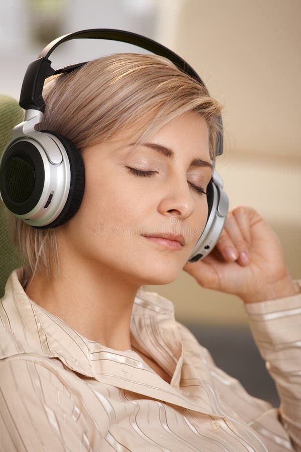 Portrait of Woman with Headset Stock Image - Image of enjoy, armchair ...