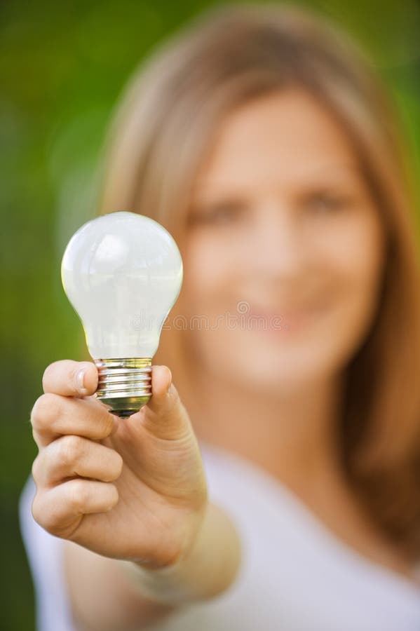 Portrait of Woman Holding Lamp Stock Photo - Image of innovation ...