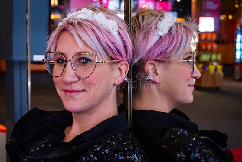 Portrait of a Woman Leaning Against a Mirror Stock Photo - Image of ...