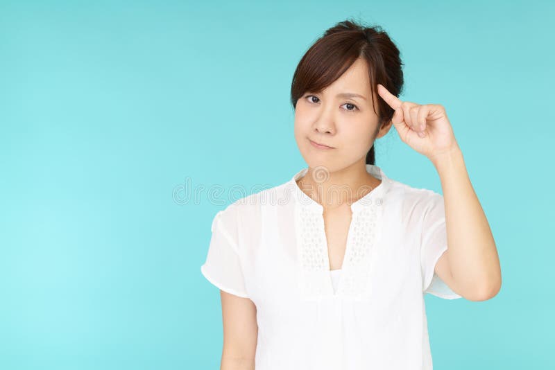 Uneasy Asian woman stock photo. Image of emotion, people - 111838682