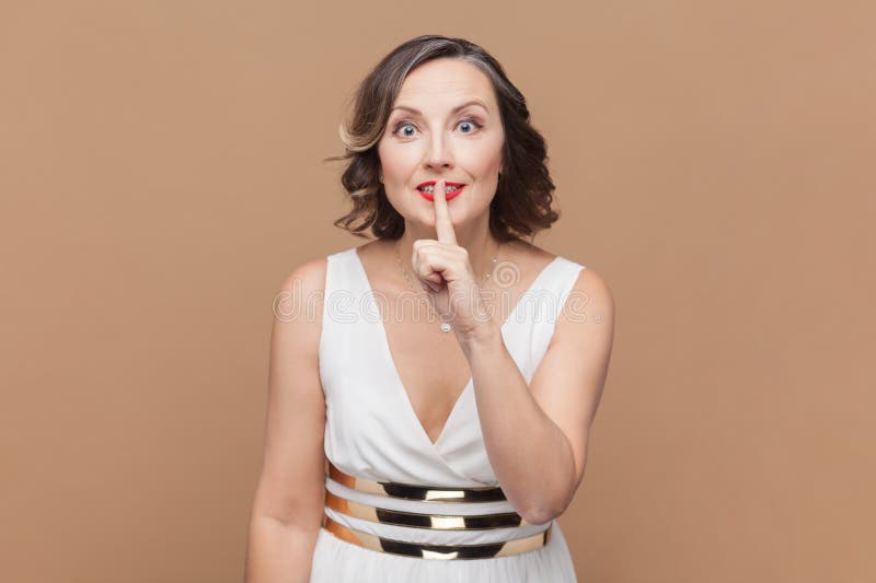 Woman Makes Silence Hush Gesture Keeps Index Fingers Over Lips Tells