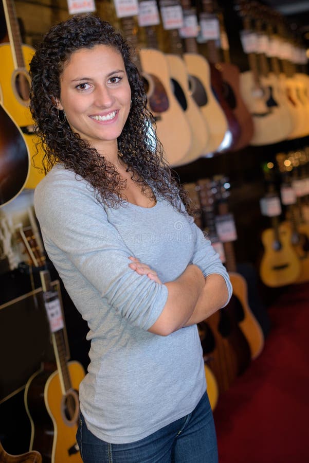 Portrait Woman in Music Store Stock Photo - Image of hair, self: 85030898