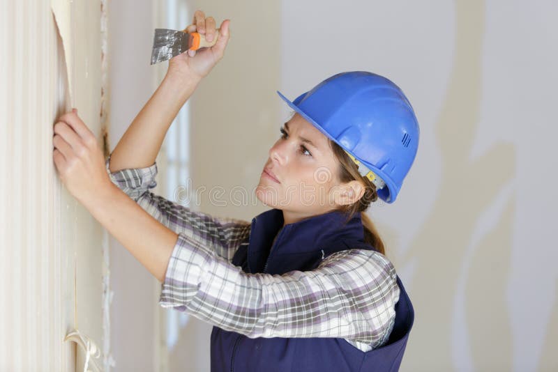 Portrait Woman Removing Wall Paper Stock Photos - Free & Royalty-Free ...