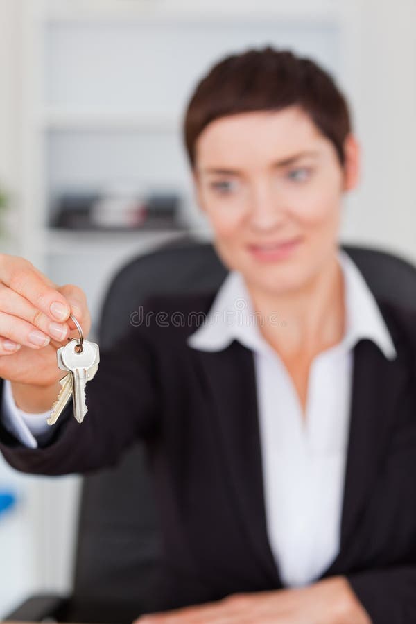 Portrait of a Woman Showing Keys Stock Image - Image of caucasian ...