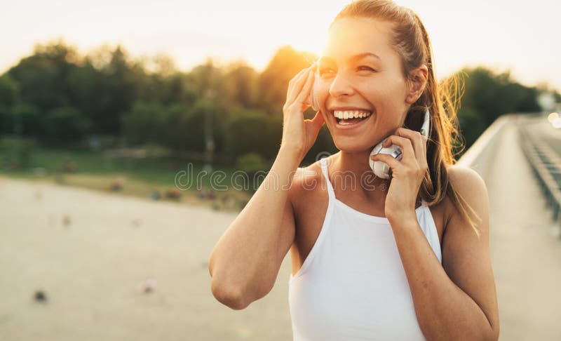 Portrait of Woman Taking Break from Jogging Stock Image - Image of ...