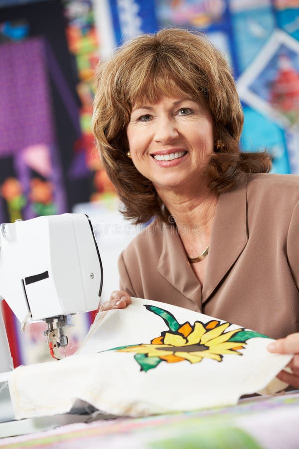 Portrait of Woman Using Electric Sewing Machine Stock Image - Image of ...
