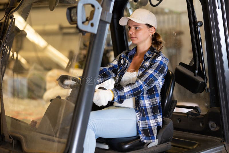 Portrait of Woman Using Forklift for Stacking Boxes Stock Photo - Image ...