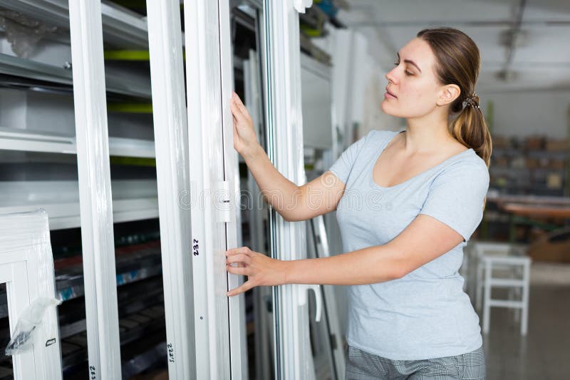 Portrait of Woman Who is Looking on Modern Windows Stock Photo - Image ...