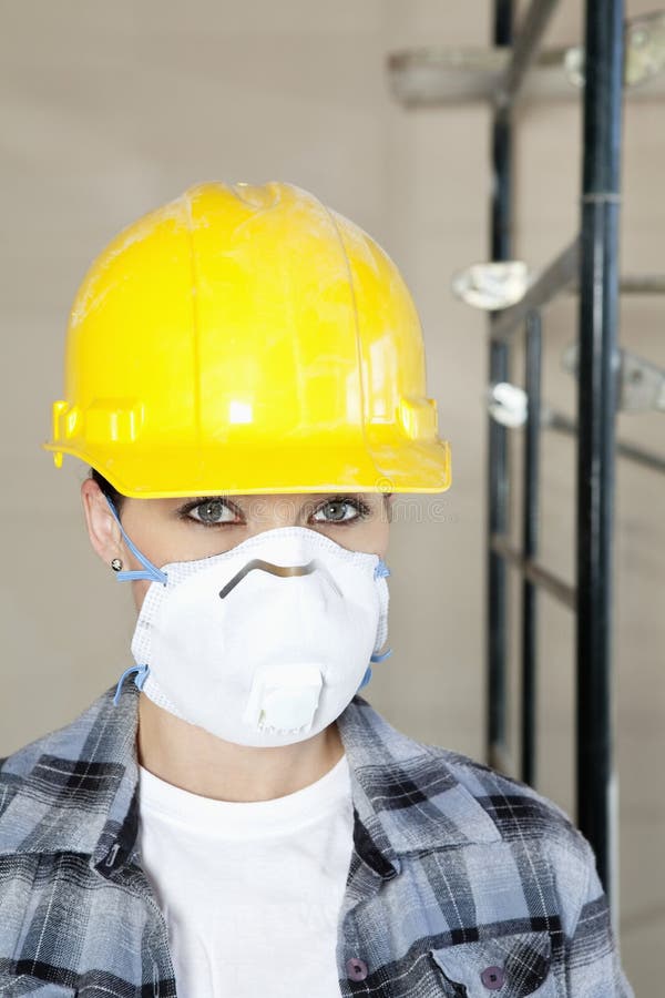 Portrait of Woman Worker Wearing Dust Mask at Construction Site Stock ...