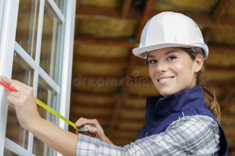 Portrait Woman Working on Window Stock Image - Image of biting, belt ...