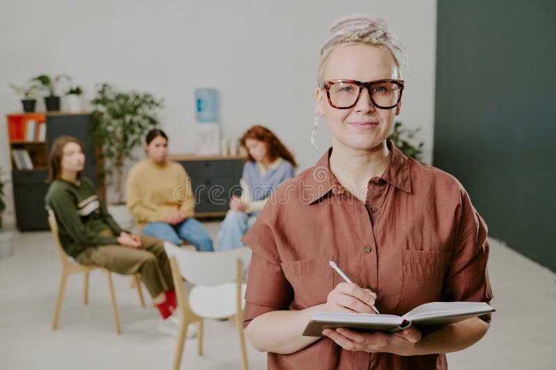 Portrait of Woman Holding Notebook in Education Setting Stock Image ...