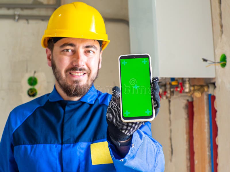 Portrait of Worker or Engineer in Blue Work Clothes and Yellow Safety ...