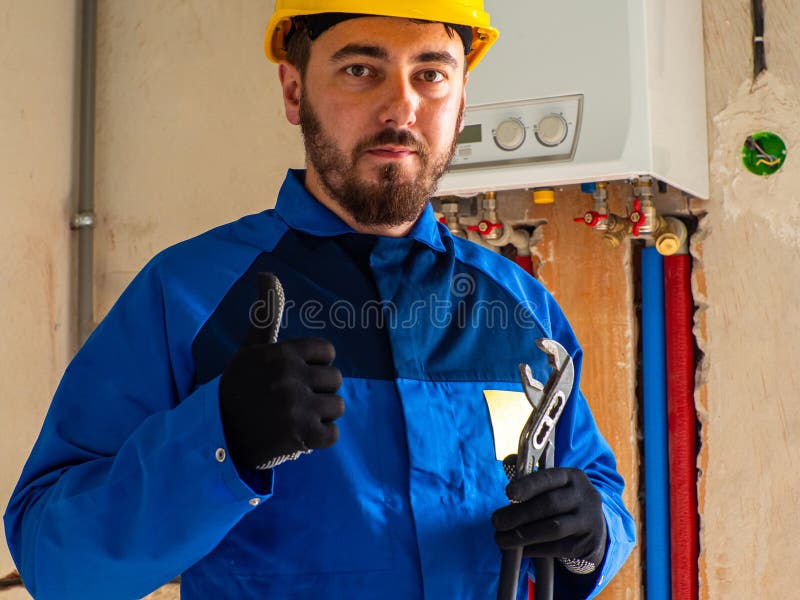 Portrait of Worker or Engineer in Blue Work Clothes and Yellow Safety ...