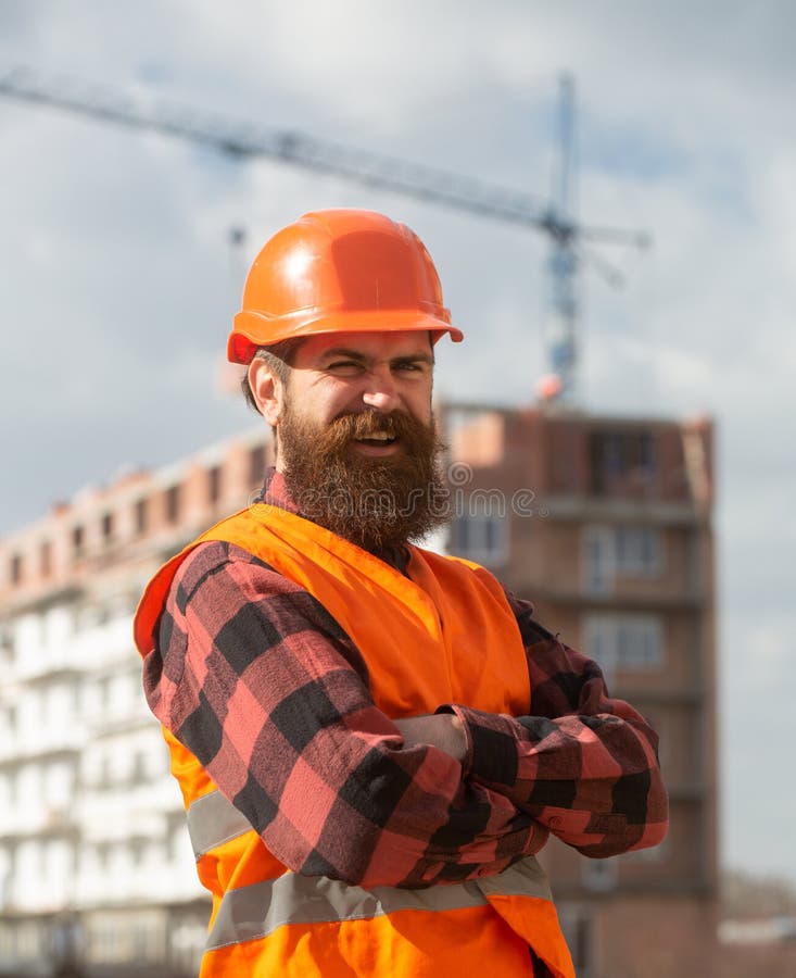 Portrait of Worker Man at Construction Site. Industrial Theme. Stock ...