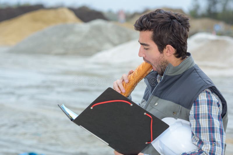 Portrait Worker Multi-tasking on Site Stock Photo - Image of ...