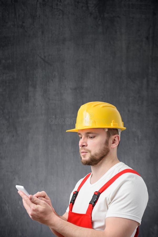 Portrait of a Worker Using His Smartphone Stock Image - Image of cell ...