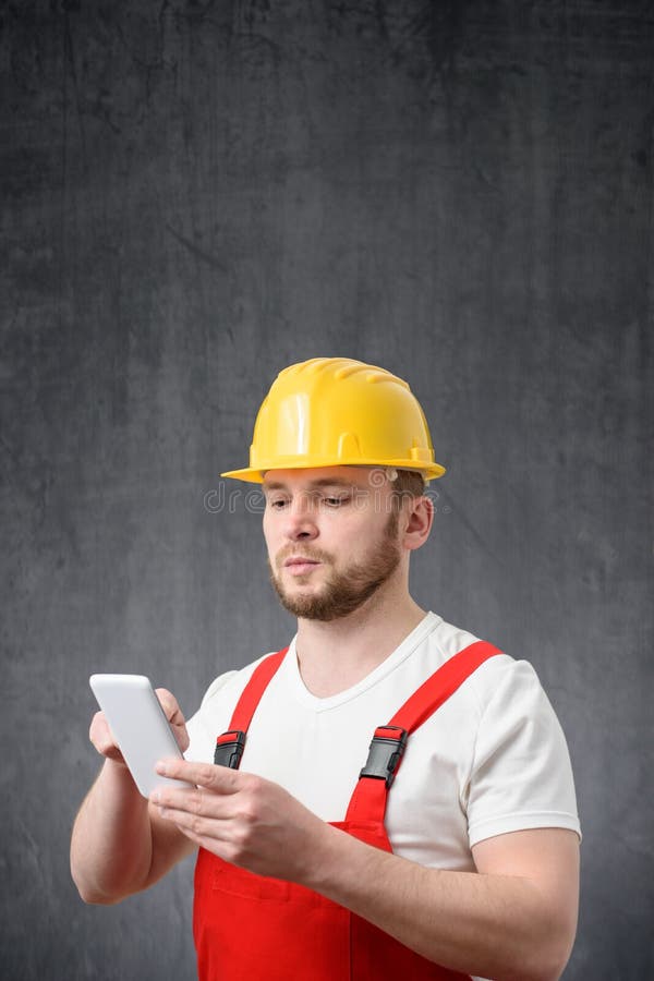 Portrait of a Worker Using His Smartphone Stock Image - Image of ...