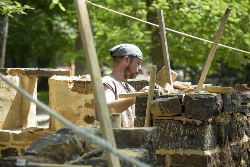 Portrait of a Worker Working on the Medieval Site of Guedelon Editorial ...
