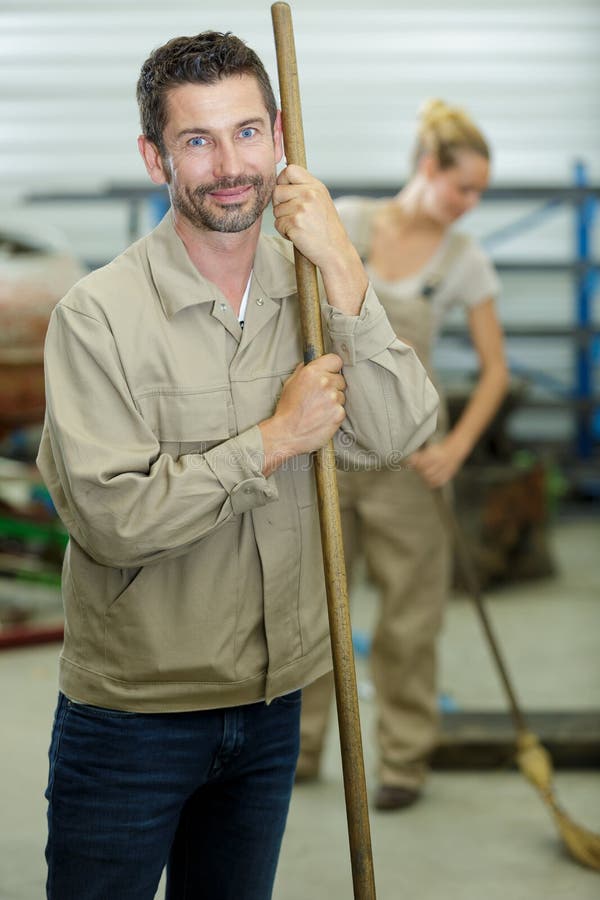 Portrait Workers Cleaning Workshop Stock Photo - Image of tidy, storage ...