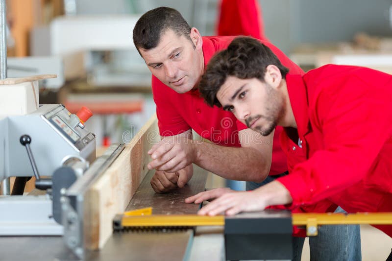 Portrait Workers Cutting Wood Stock Photo - Image of thumb, sawing ...