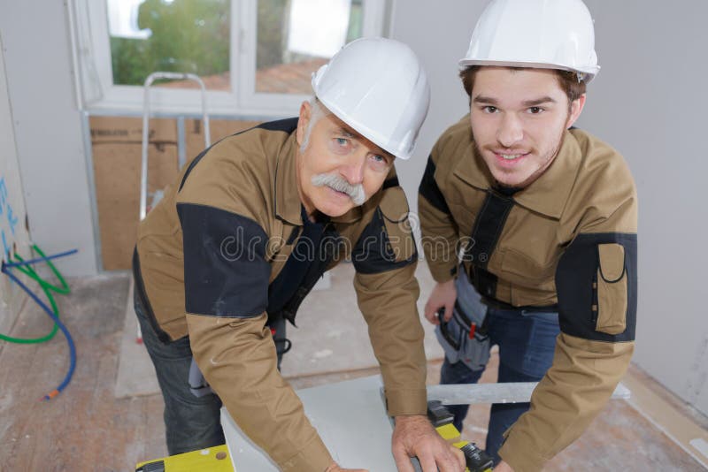 Portrait workers on site stock photo. Image of labor - 245860698
