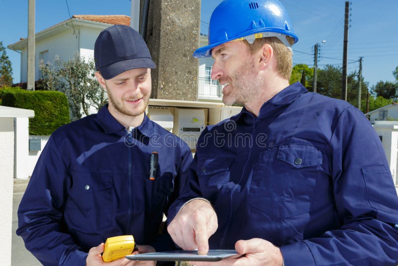 Portrait Workers Talking Outdoors Stock Image - Image of building, work ...