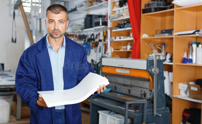 Portrait of a Working Man at Printer Studio Stock Photo - Image of ...