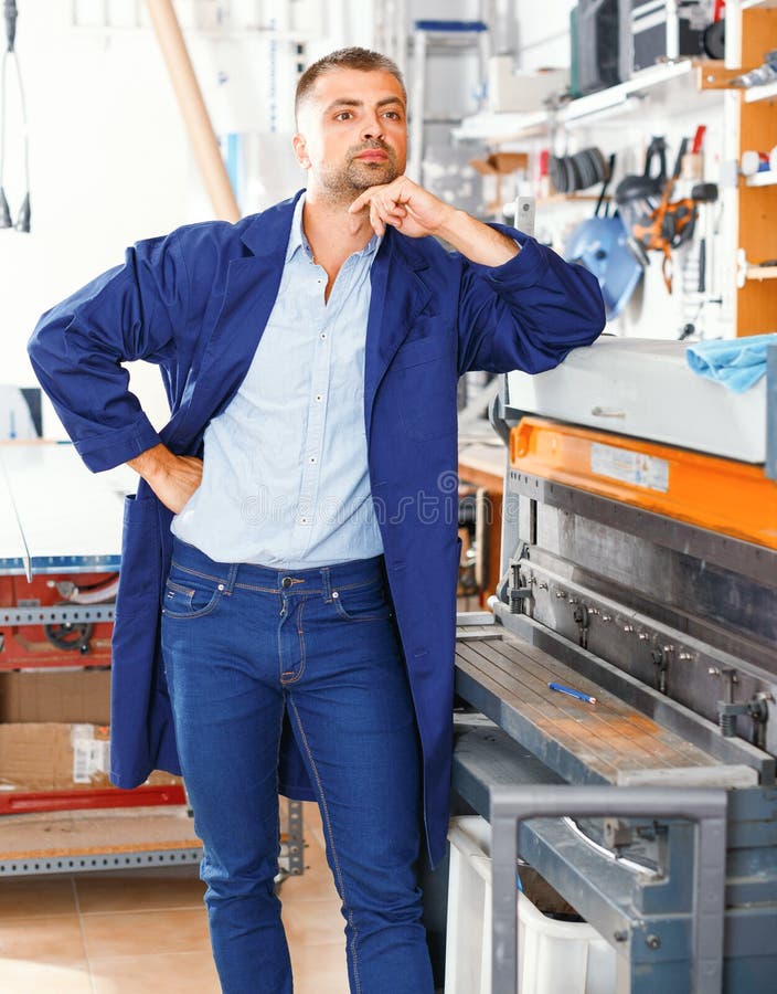 Portrait of a Working Man at Printer Studio Stock Photo - Image of ...