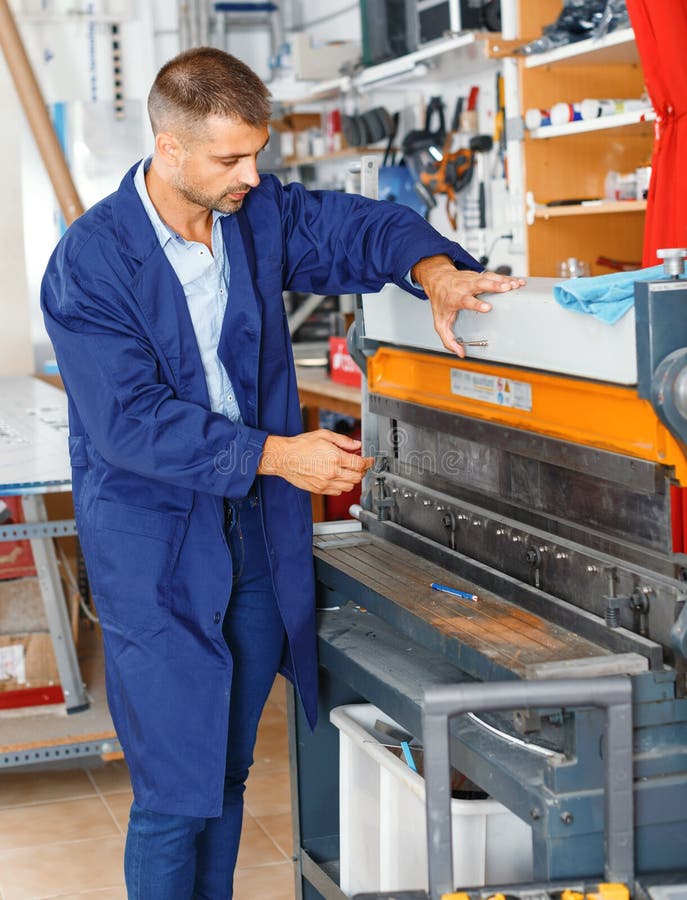Portrait of a Working Man at Printer Studio Stock Photo - Image of ...