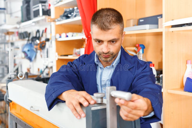 Portrait of a Working Man at Printer Studio Stock Photo - Image of ...